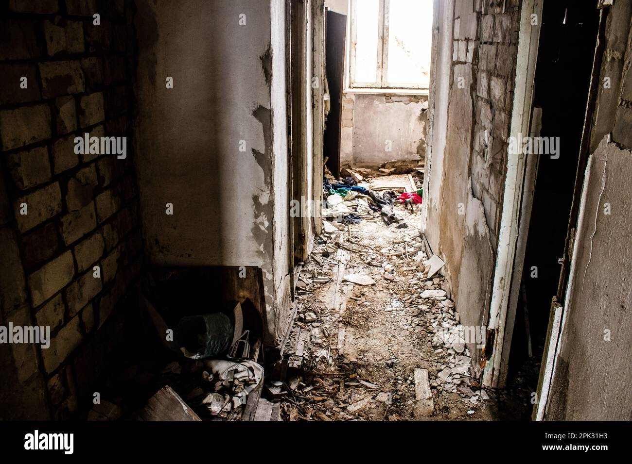 Interior of a house destroyed by a Russian bombardment. Objects of ...