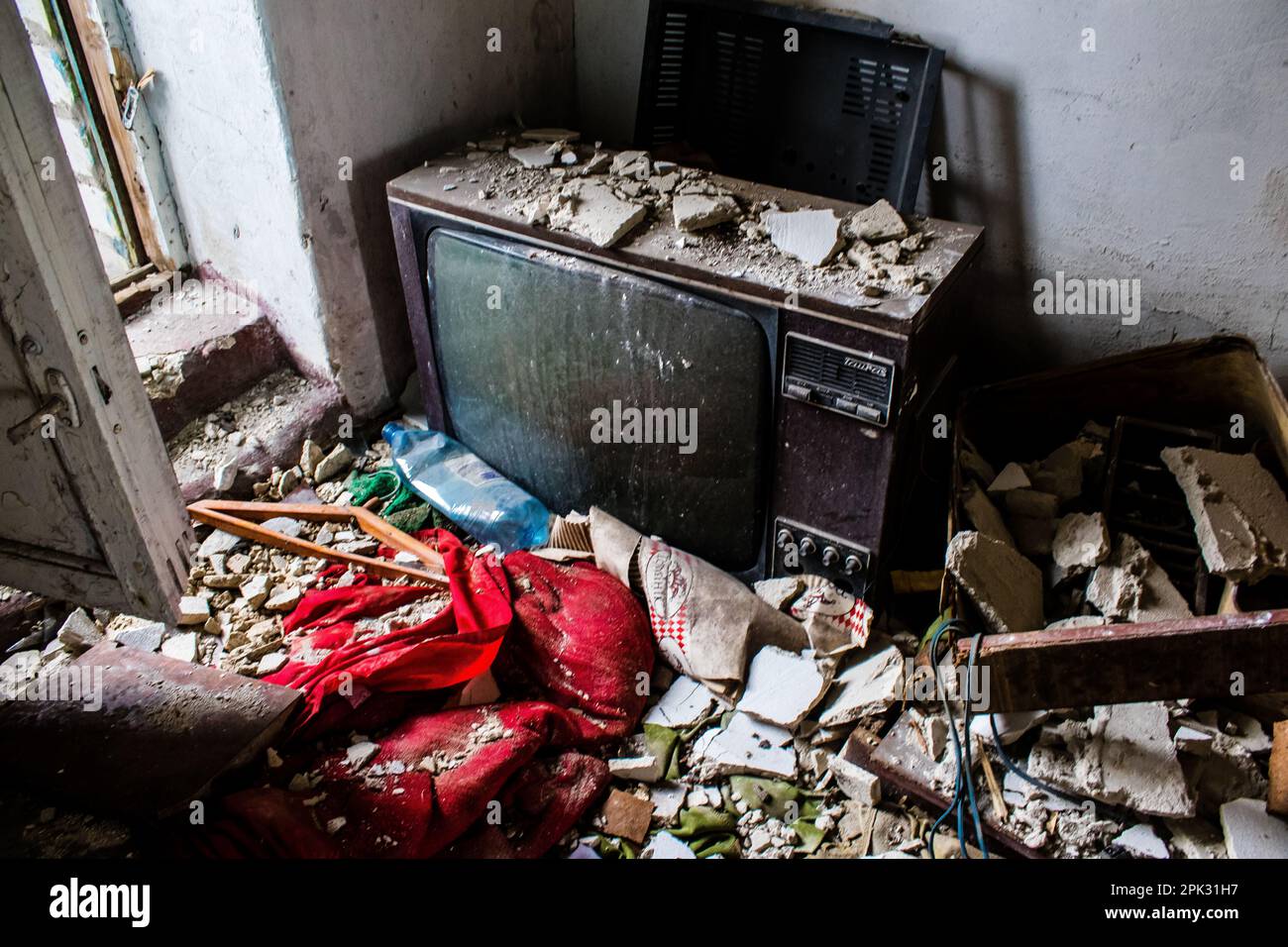 Interior of a house destroyed by a Russian bombardment. Objects of ...