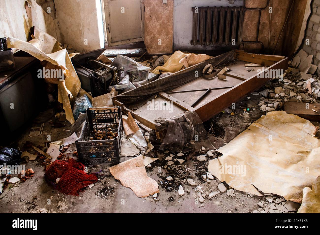 Interior of a house destroyed by a Russian bombardment. Objects of ...