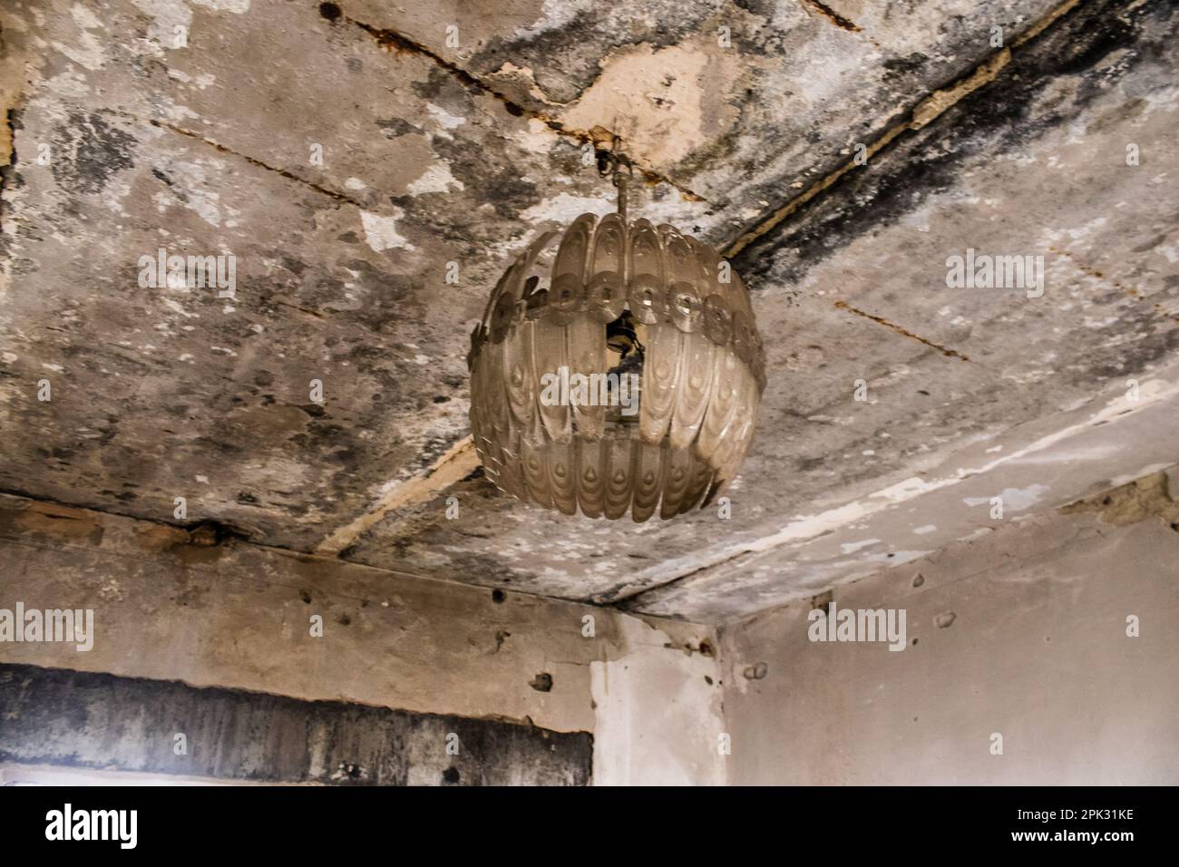 Interior of a house destroyed by a Russian bombardment. Objects of ...