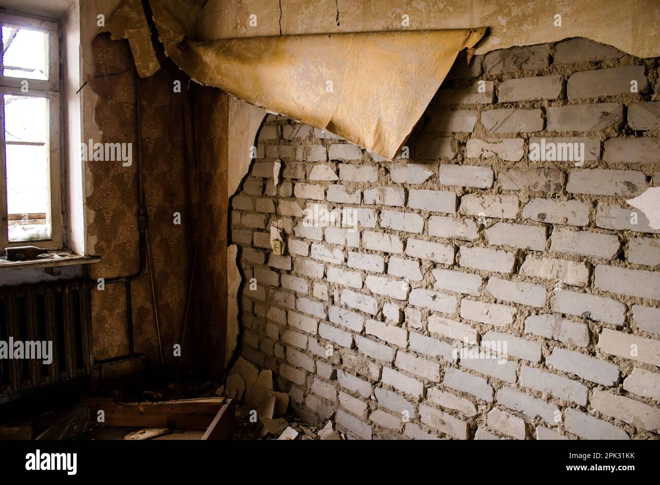 Interior of a house destroyed by a Russian bombardment. Objects of ...