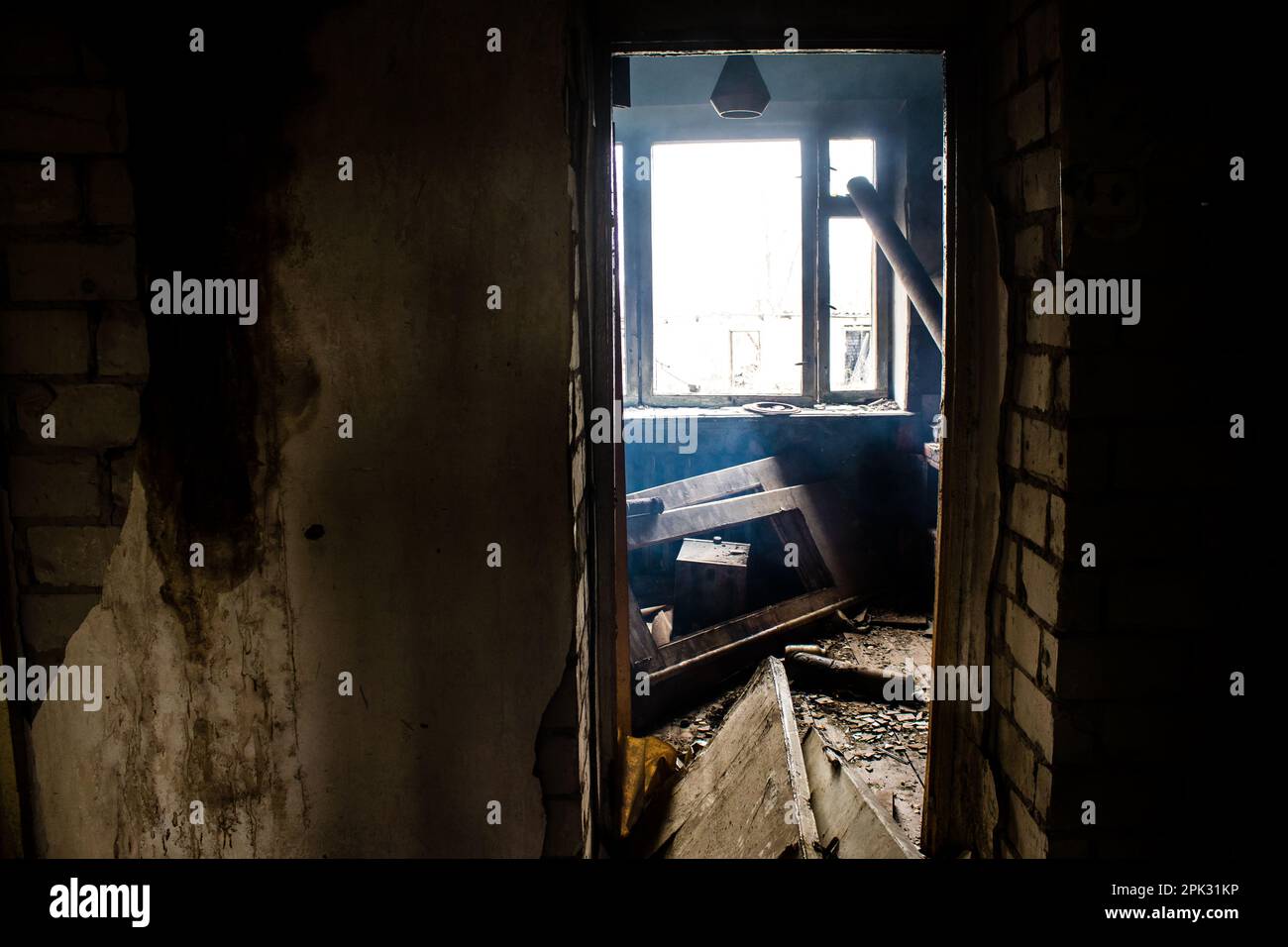 Interior of a house destroyed by a Russian bombardment. Objects of ...