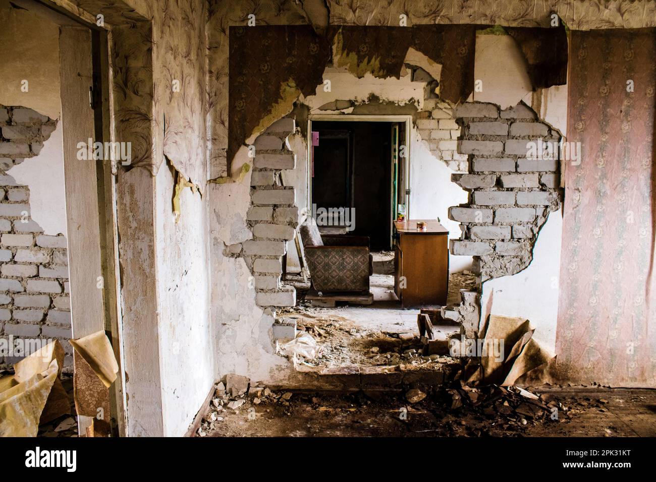 Interior of a house destroyed by a Russian bombardment. Objects of ...