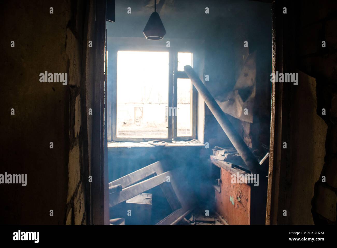 Interior of a house destroyed by a Russian bombardment. Objects of ...