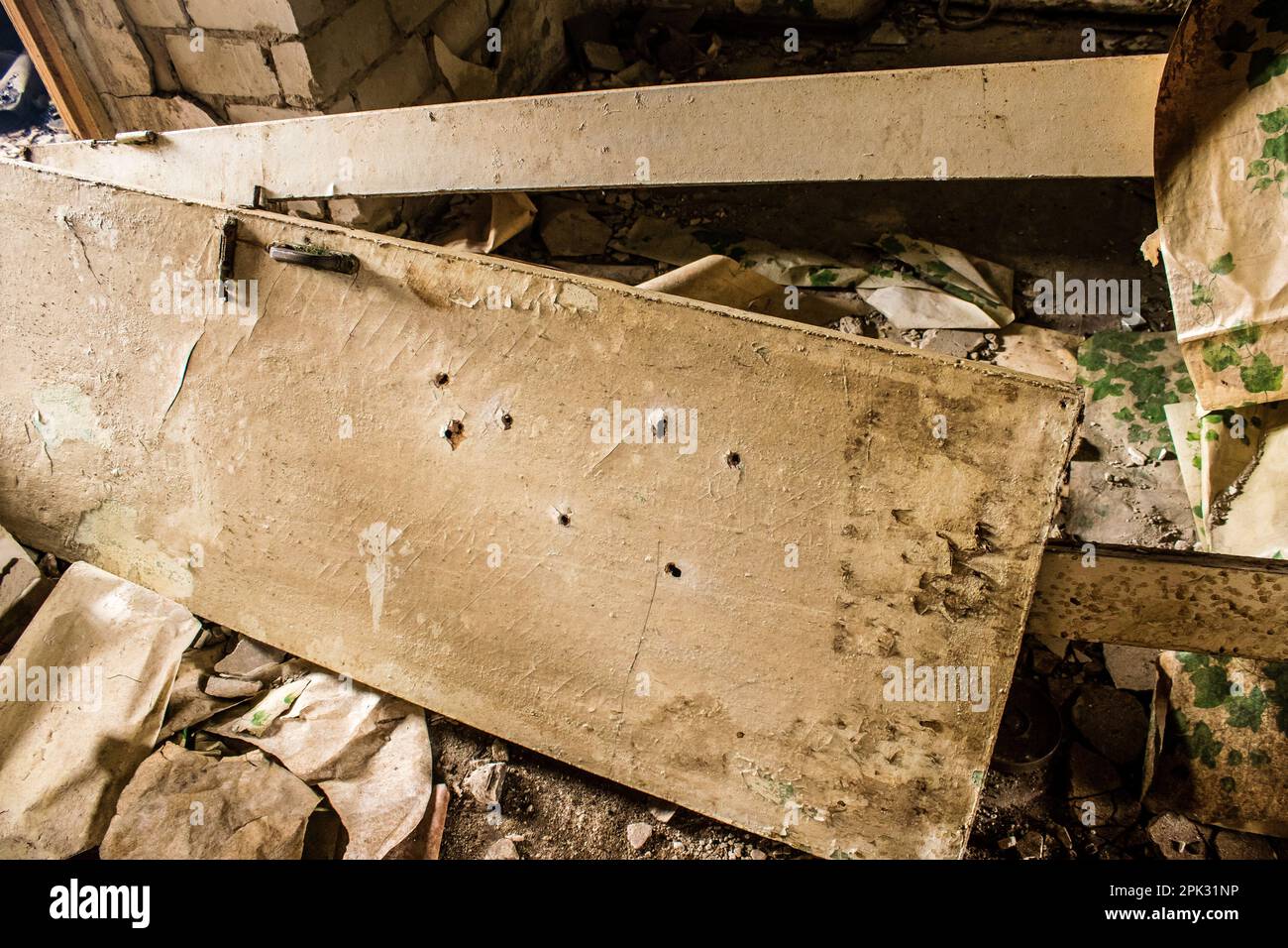 Interior of a house destroyed by a Russian bombardment. Objects of ...