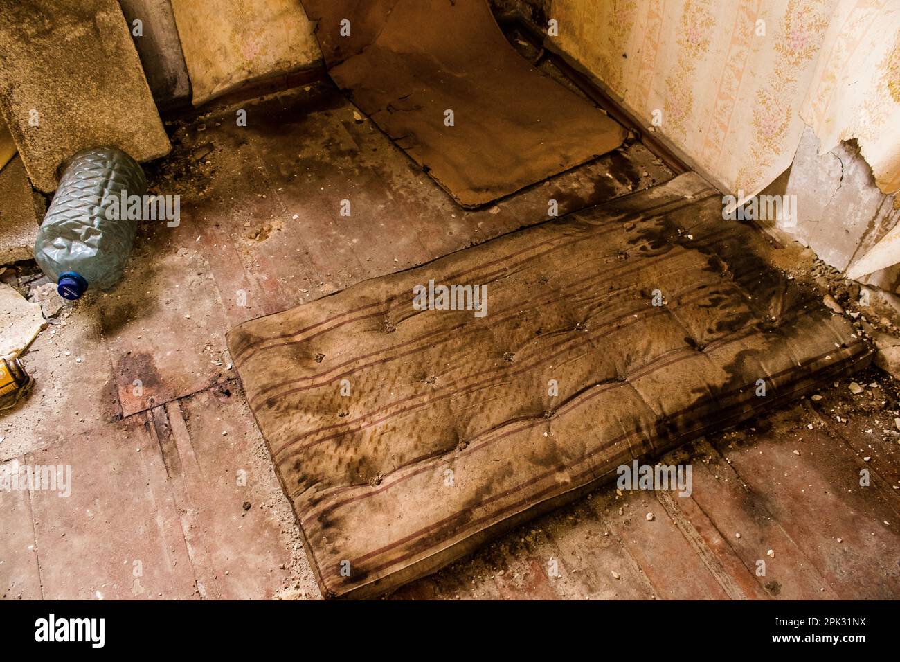 Interior of a house destroyed by a Russian bombardment. Objects of ...