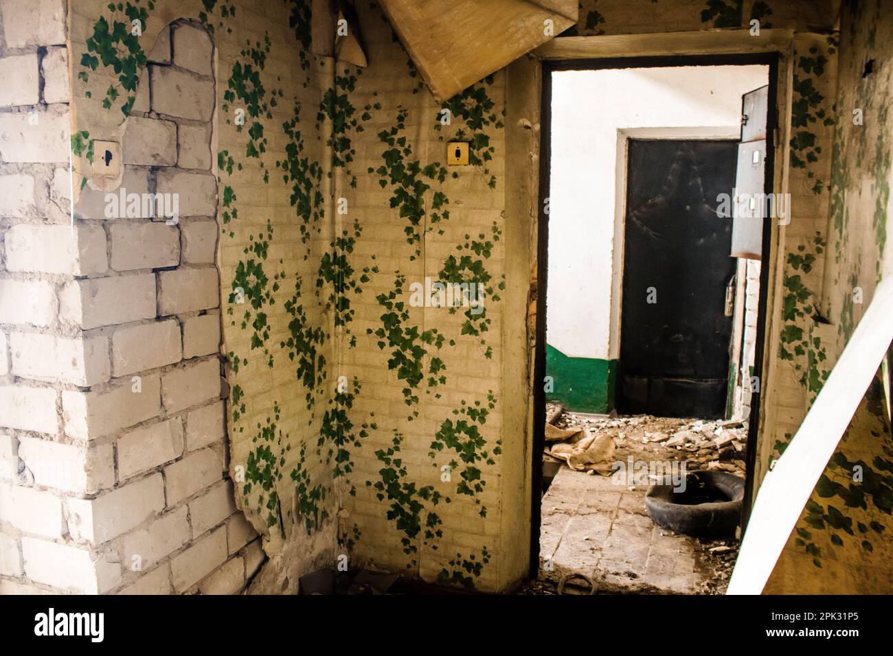 Interior of a house destroyed by a Russian bombardment. Objects of ...