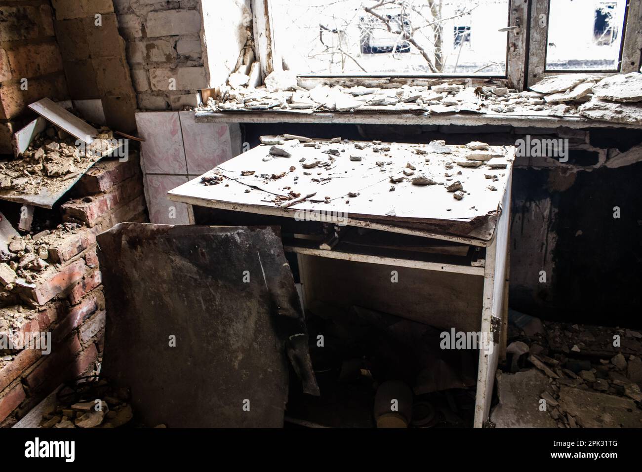 Interior of a house destroyed by a Russian bombardment. Objects of ...
