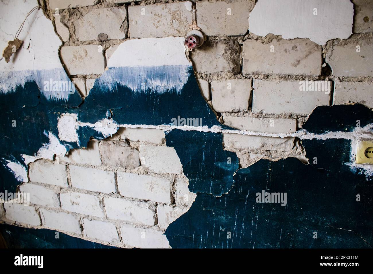 Interior of a house destroyed by a Russian bombardment. Objects of ...