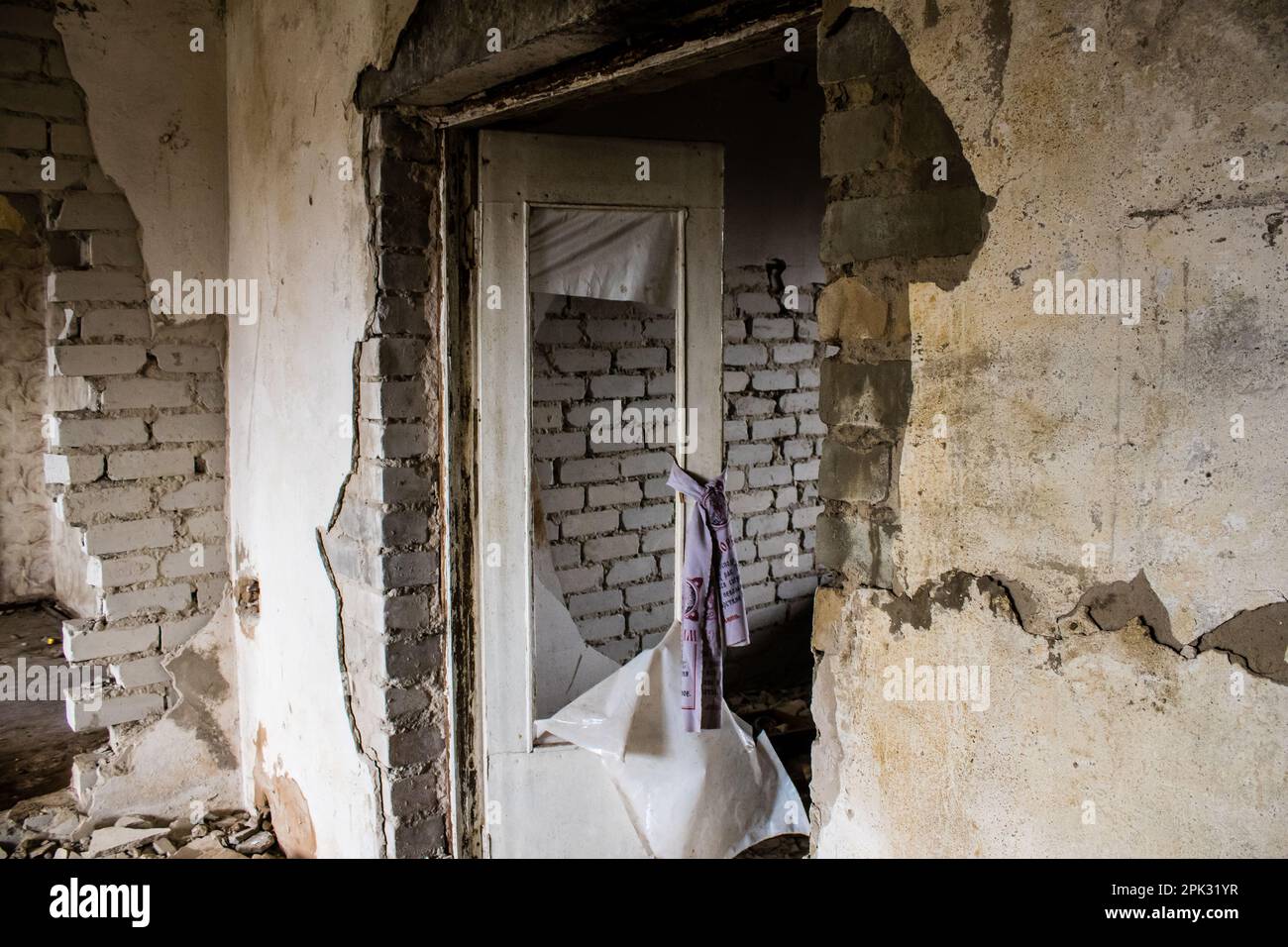 Interior of a house destroyed by a Russian bombardment. Objects of ...