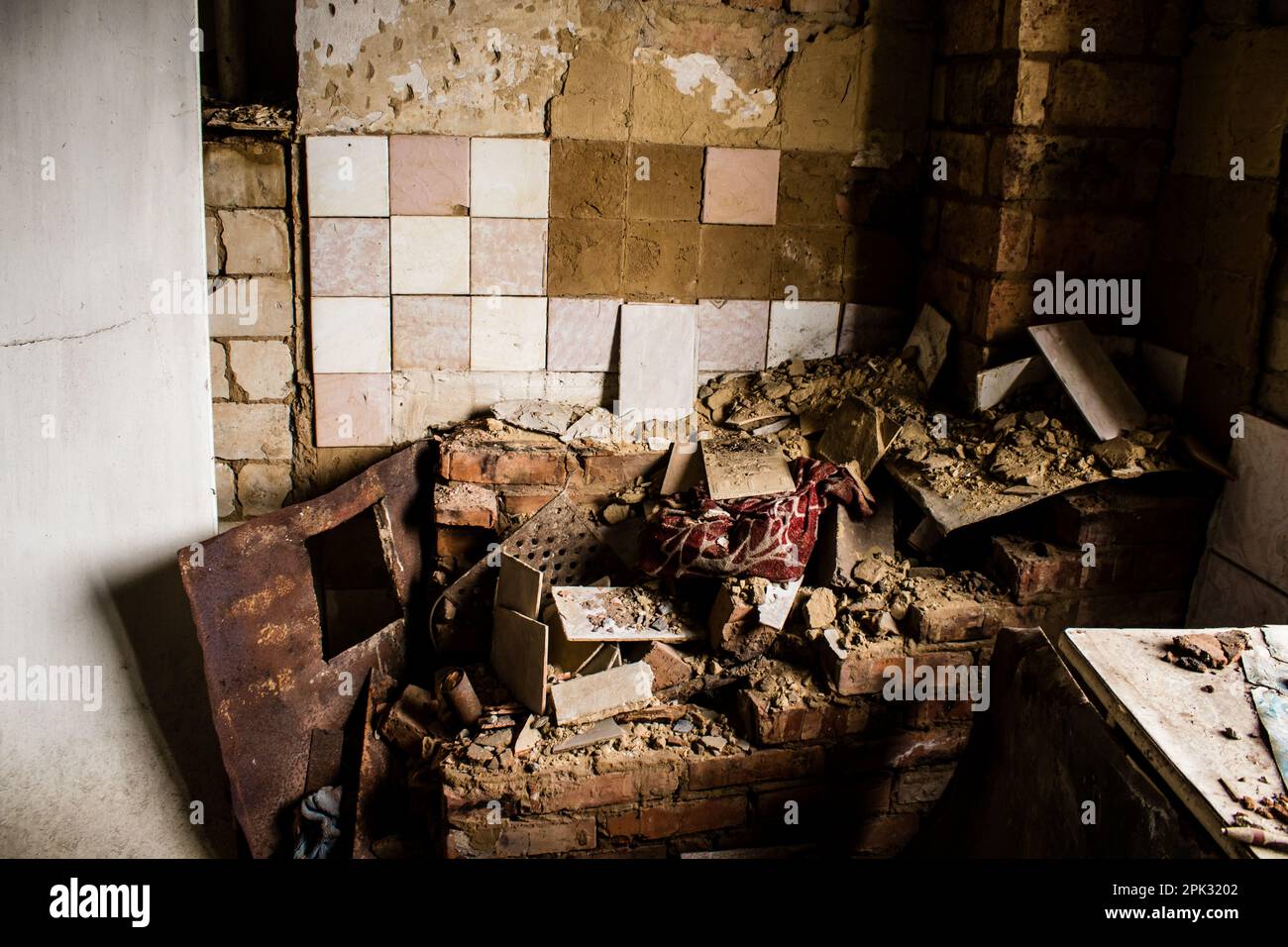 Interior of a house destroyed by a Russian bombardment. Objects of ...