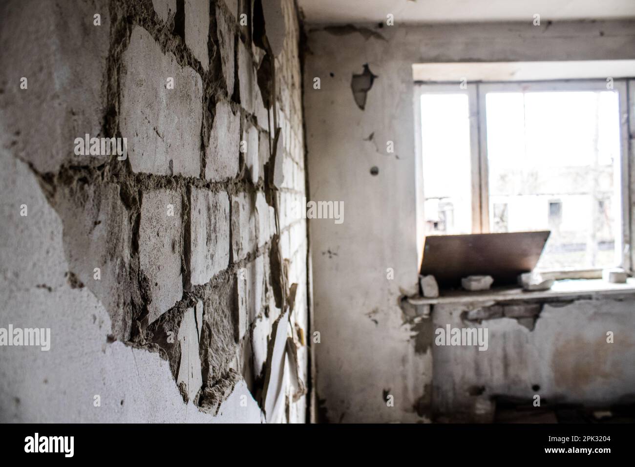 Interior of a house destroyed by a Russian bombardment. Objects of ...