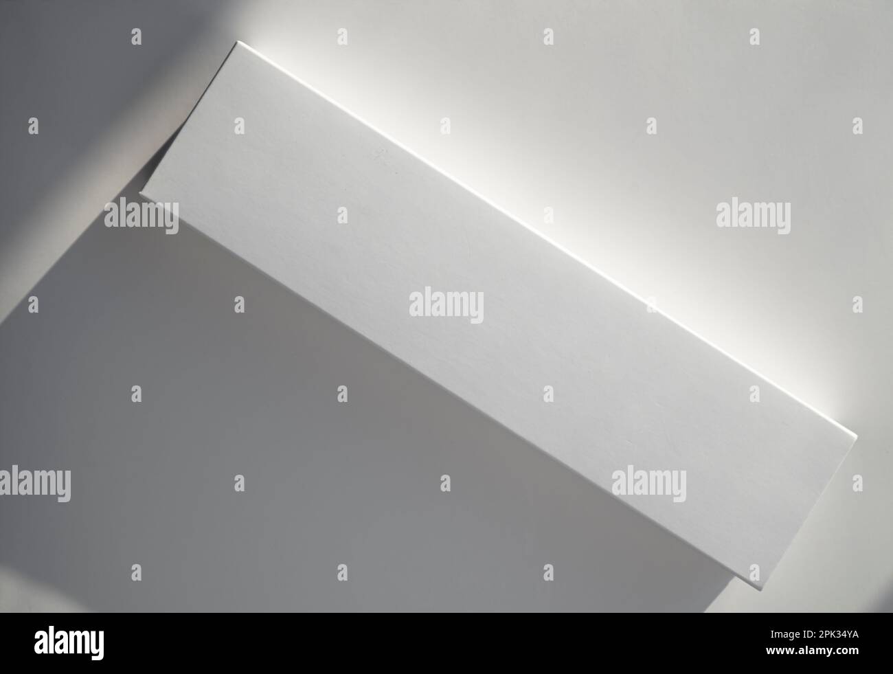 Real rectangle paper box with sunlight on surface. Blank cardboard ...