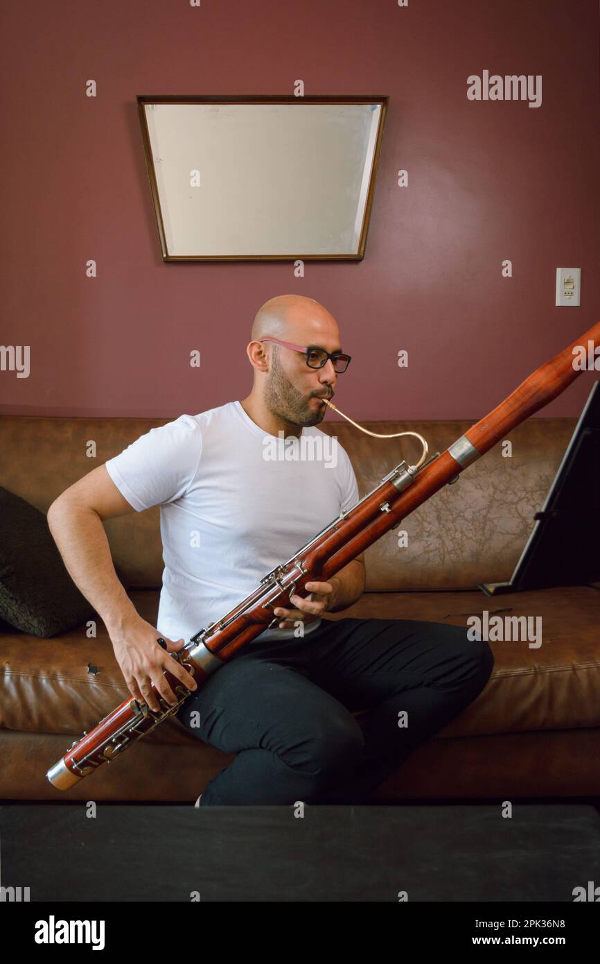 young hispanic latino man of venezuelan ethnicity, bald and wearing ...