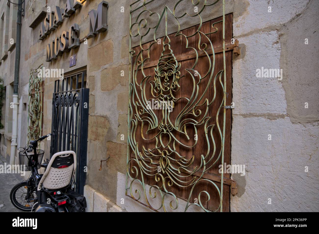 Old weathered metal ornate window guard in an abandoned museum of ...