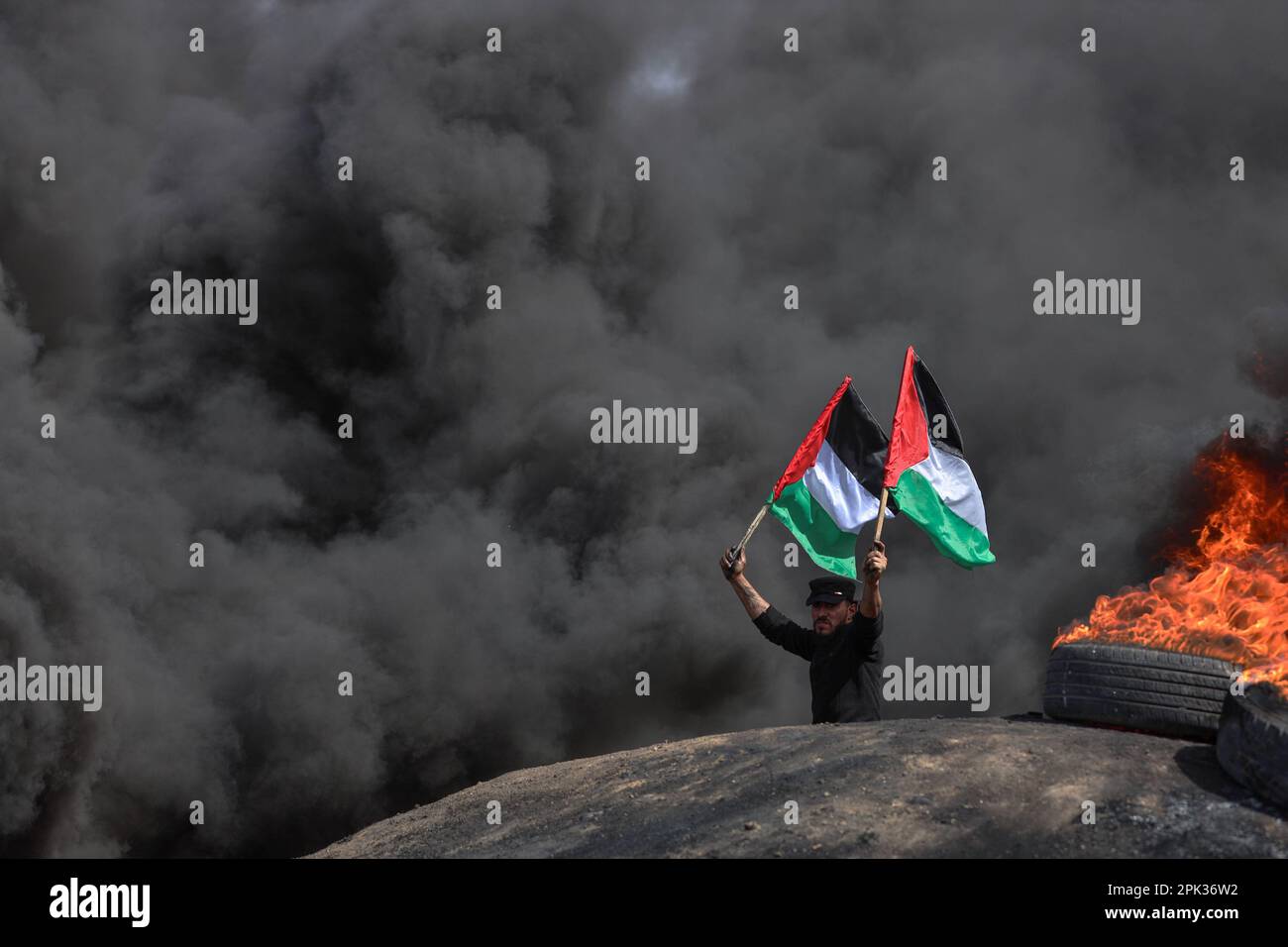 Gaza, Palestine. 5th Apr, 2023. (INT) Palestinian youths set fire to ...