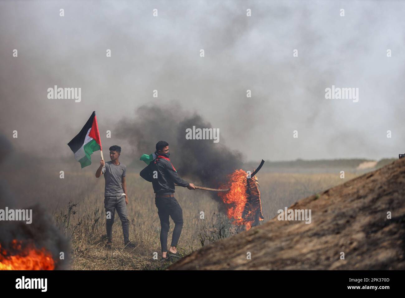 Gaza, Palestine. 5th Apr, 2023. (INT) Palestinian youths set fire to ...