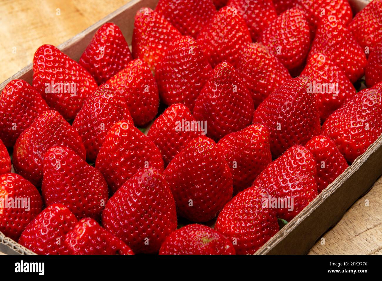 New harvest, 1 kilogram paper box of ripe red sweet Spanish strawberry ...
