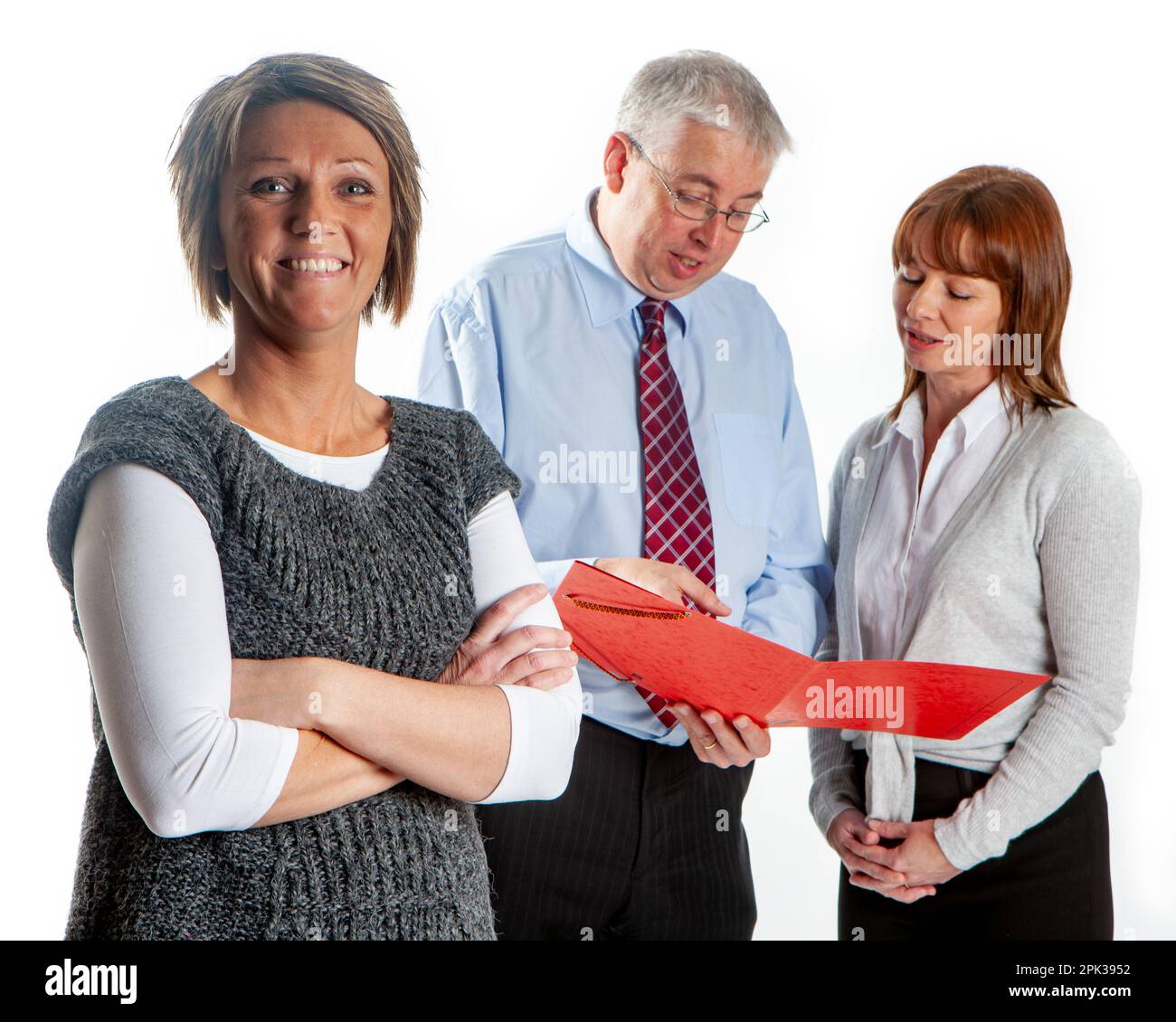 Business team looking sales figures hi-res stock photography and images ...