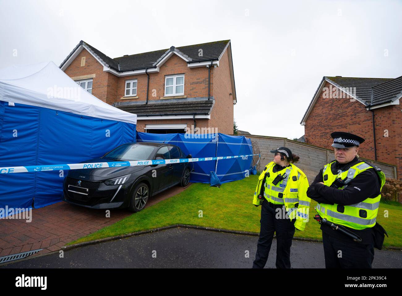 Uddingston, Scotland, UK. 5 April 2023. Police at the home of former ...