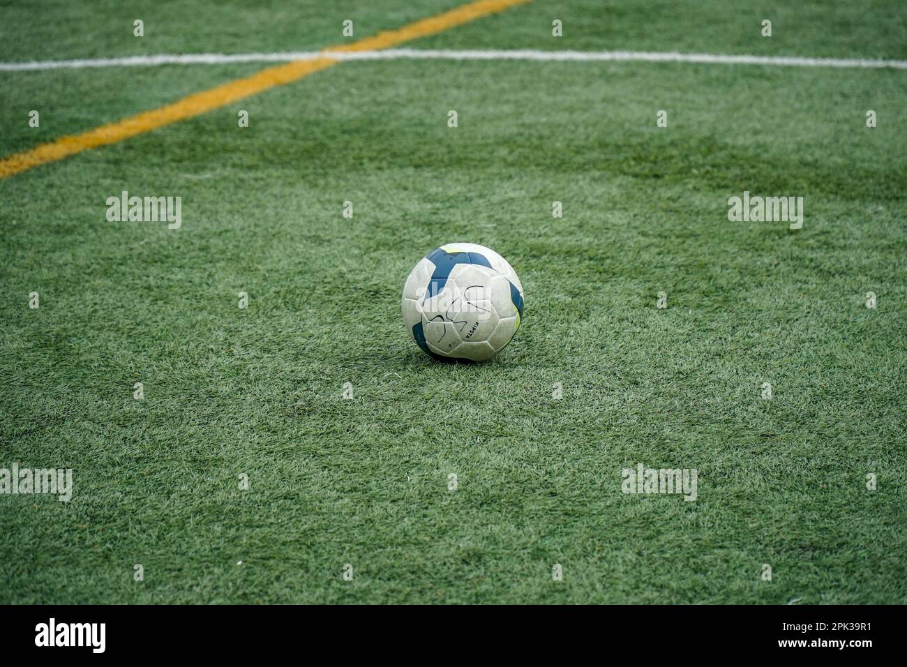 Football ball rolling over grass hi-res stock photography and images ...