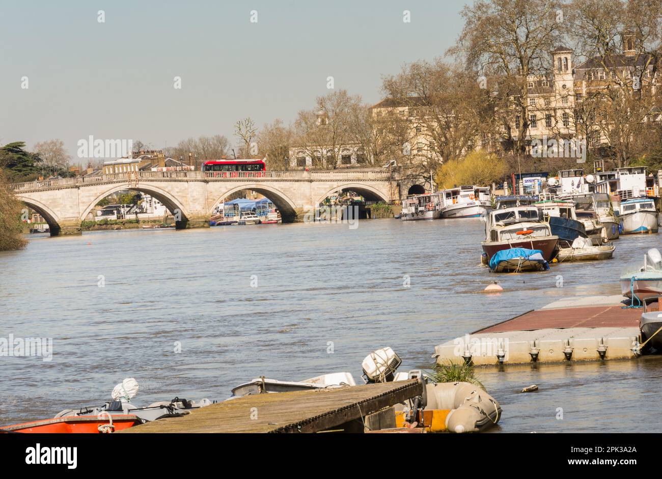 Rowing boats moored next to Richmond Bridge, an 18th-century stone arch ...