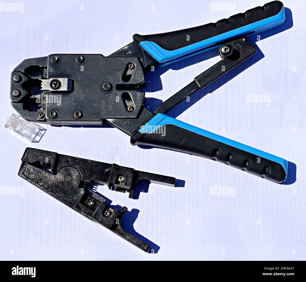 Ethernet cable Crimping tools on a white background Stock Photo - Alamy