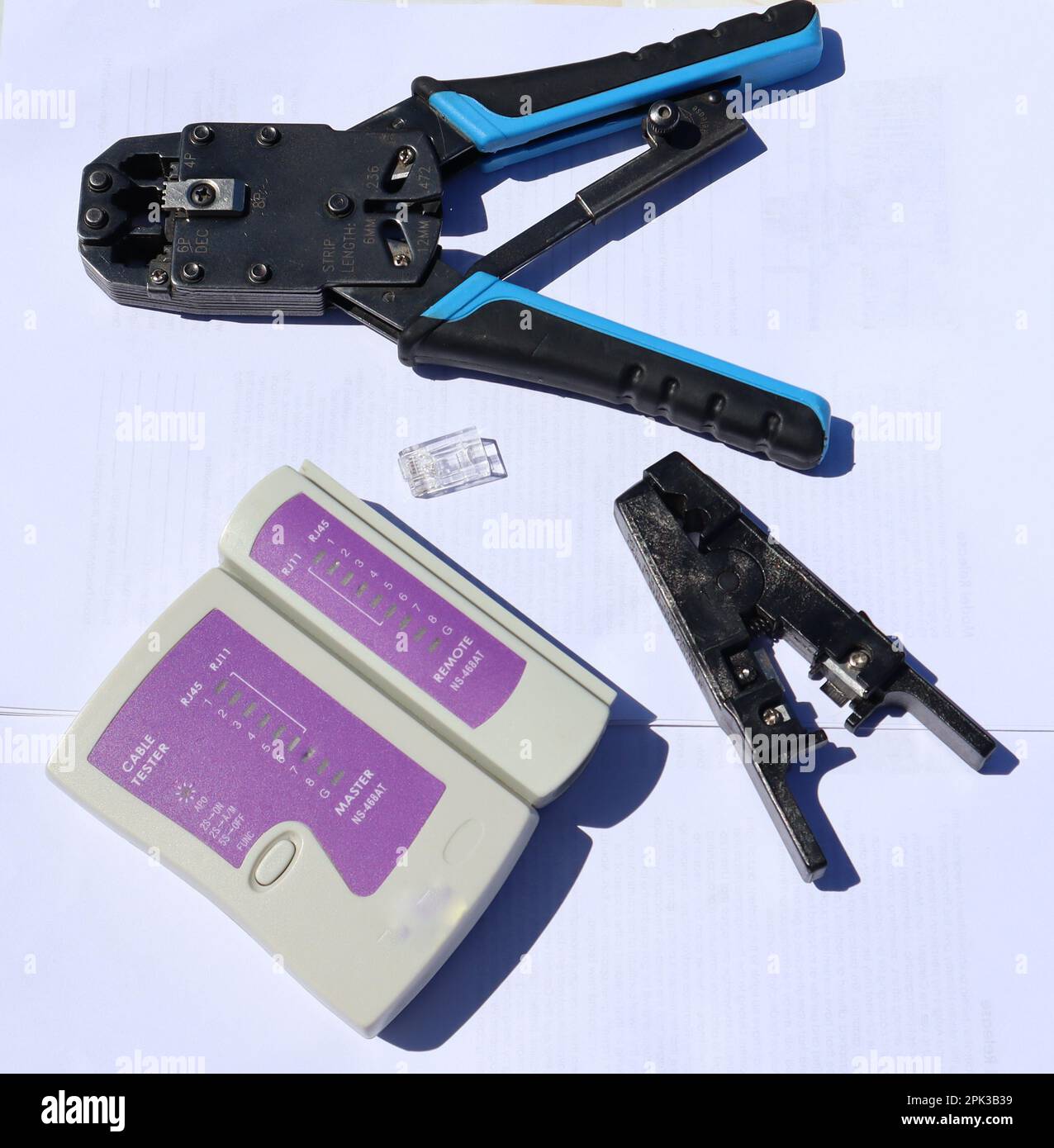Ethernet cable Crimping tools on a white background Stock Photo - Alamy