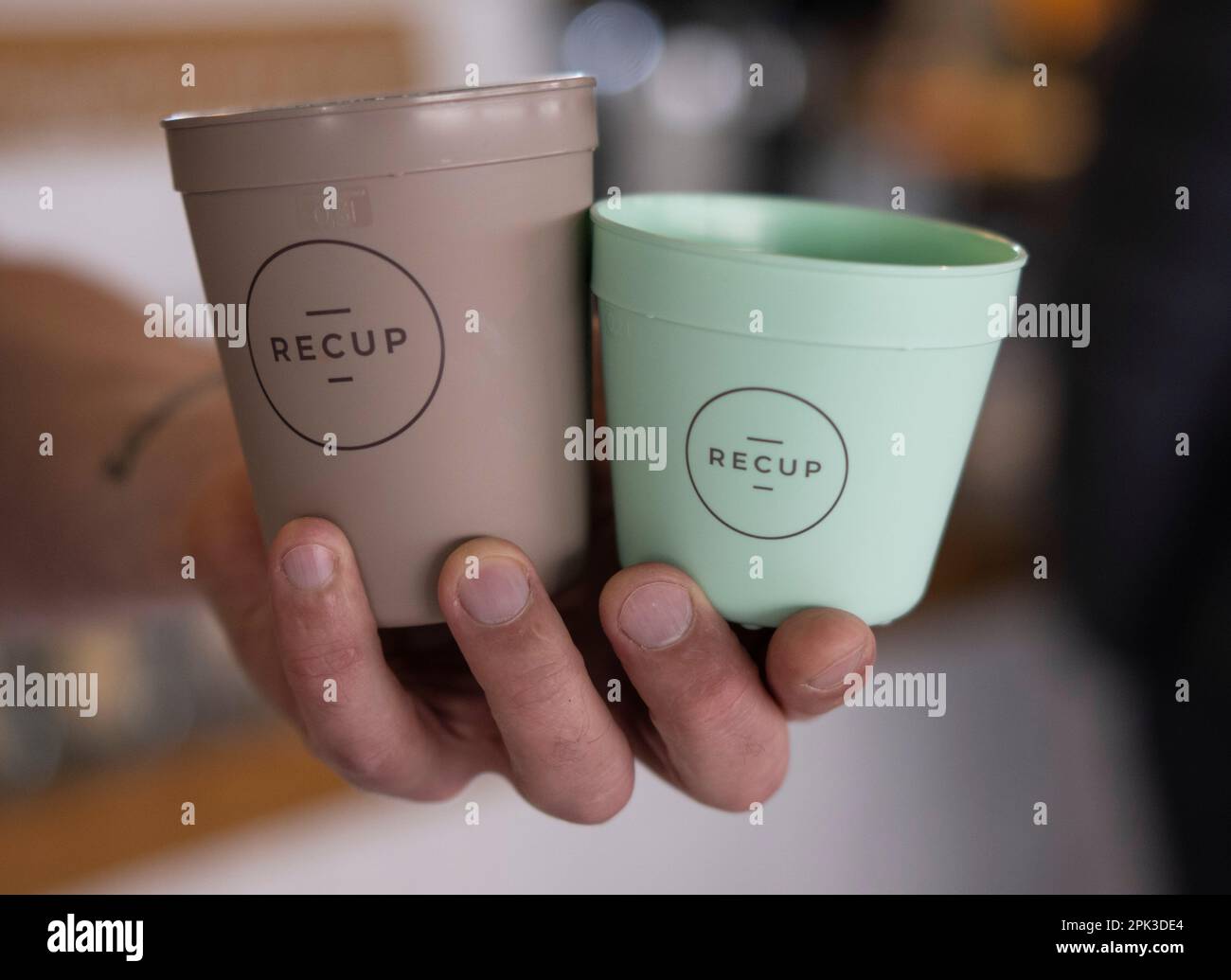 05 April 2023, Hesse, Frankfurt/Main: Two reusable cups from the ...
