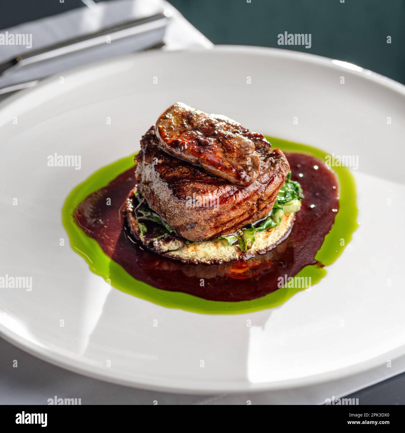 Tournedos Rossini. Foie gras, Black Angus beef tenderloin, with red ...