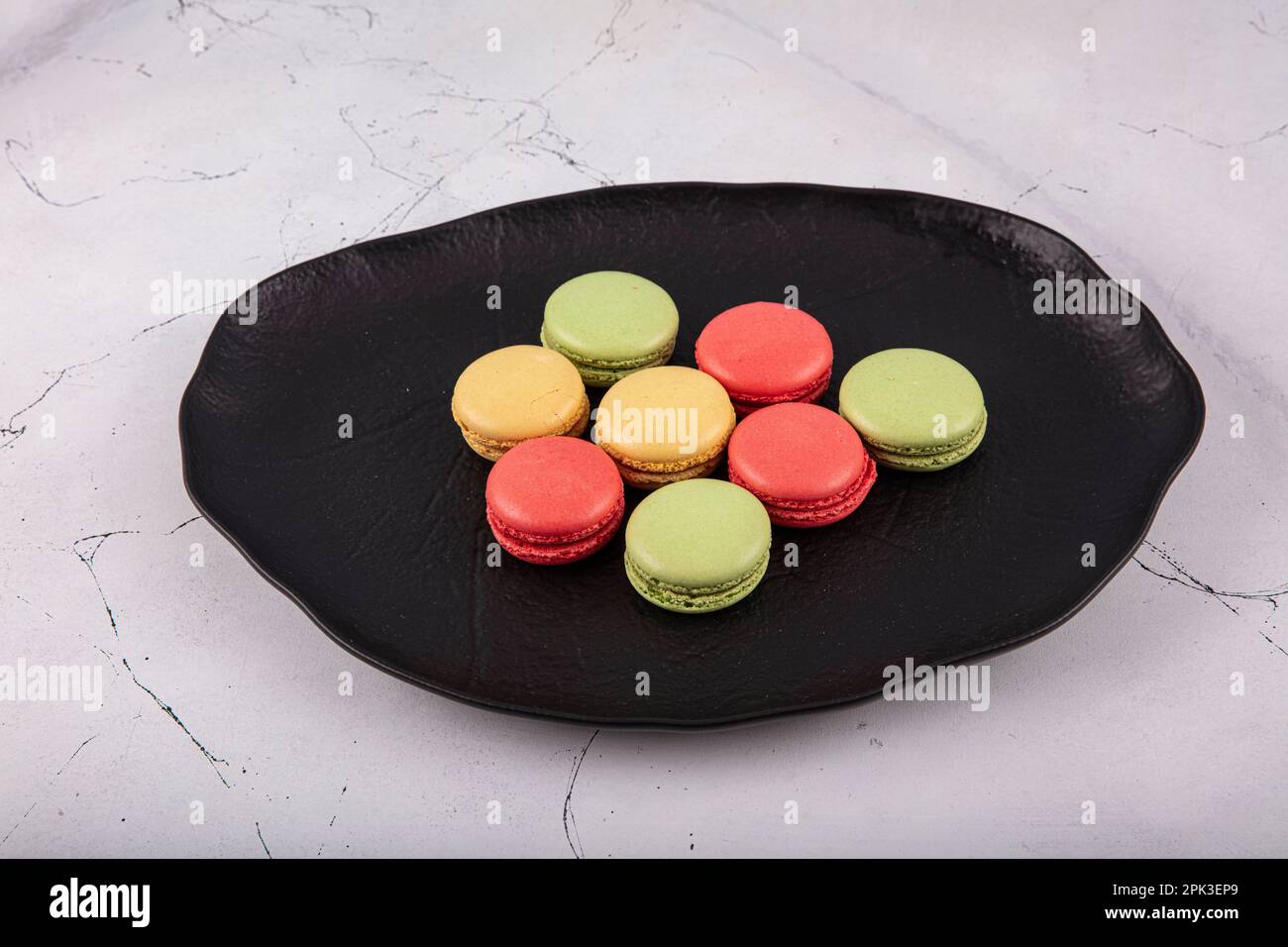 Colorful macarons cakes. Small french muffins. Sweet and colorful ...