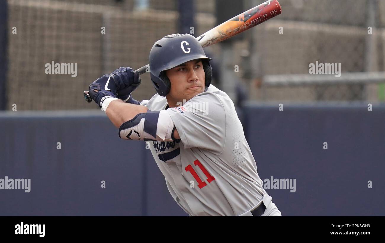 UConn outfielder Jacob Studley (11) bats during an NCAA baseball game ...