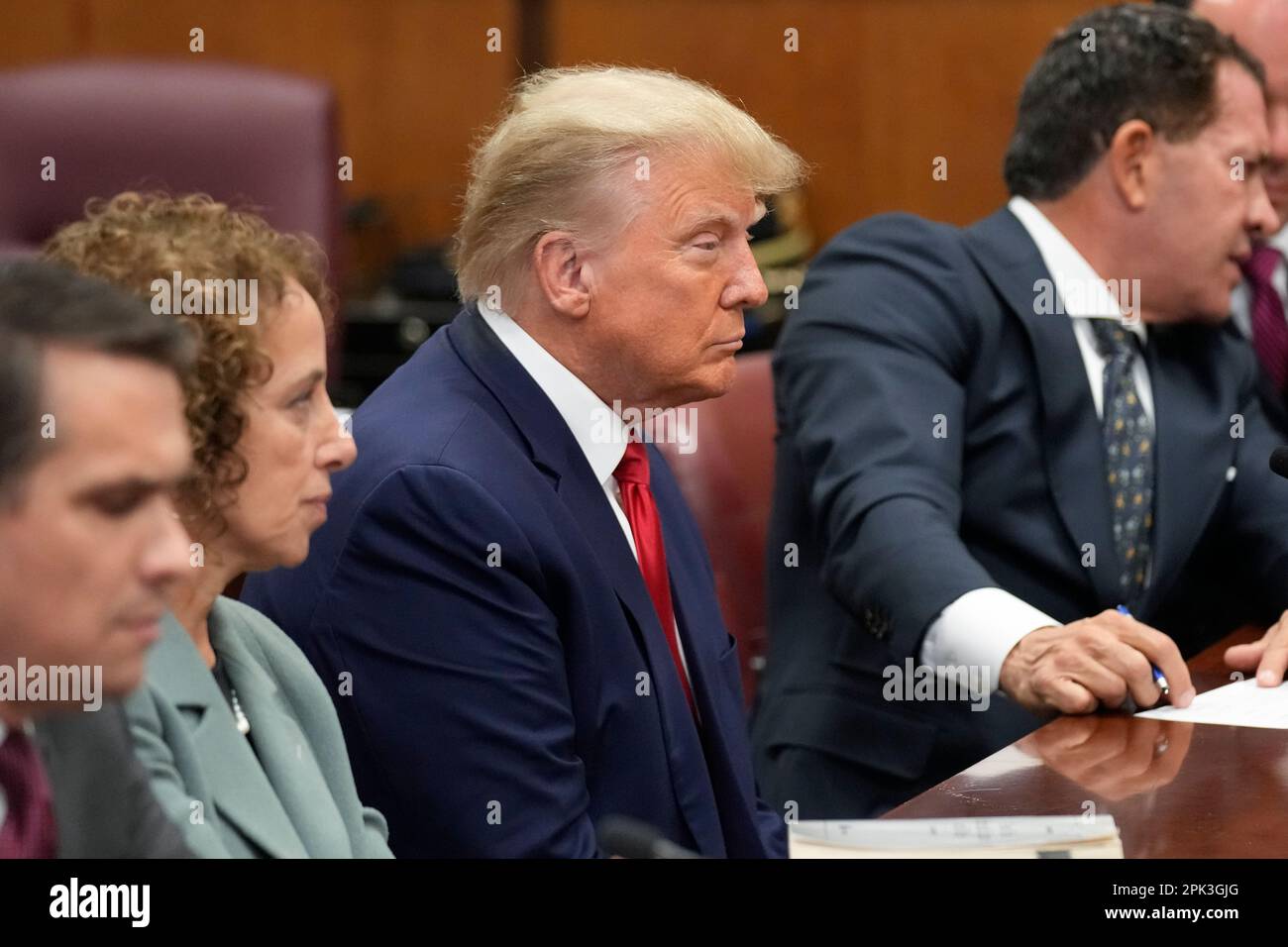 Former President Donald Trump appears in court for his arraignment ...