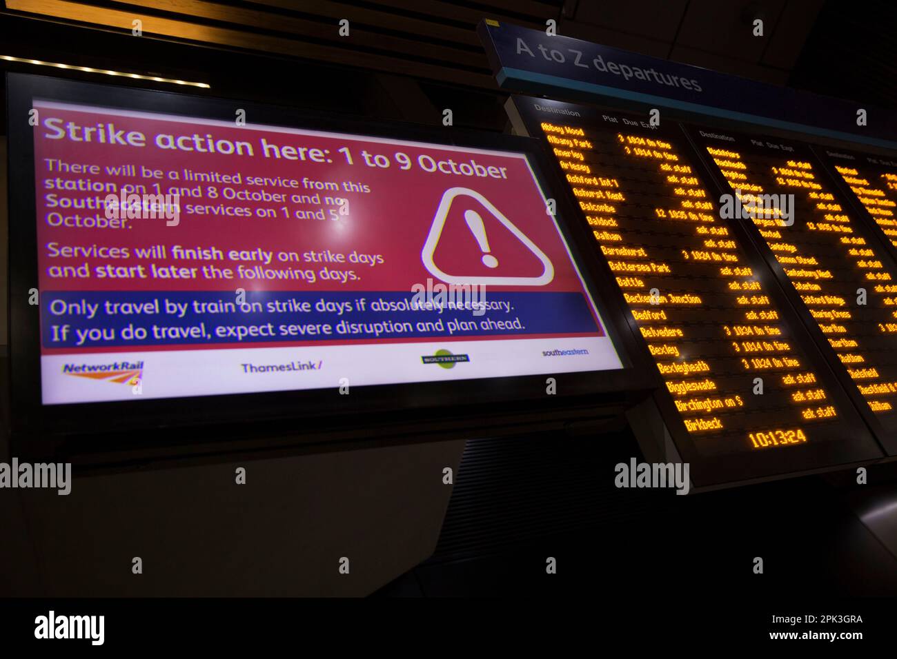An electric timetable is seen at London Bridge railway station in ...