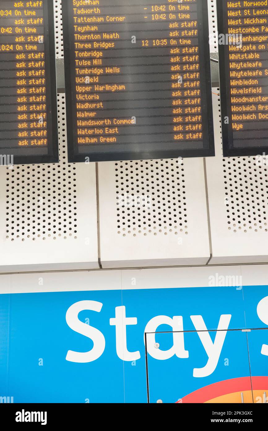 An electric timetable is seen at London Bridge railway station in ...