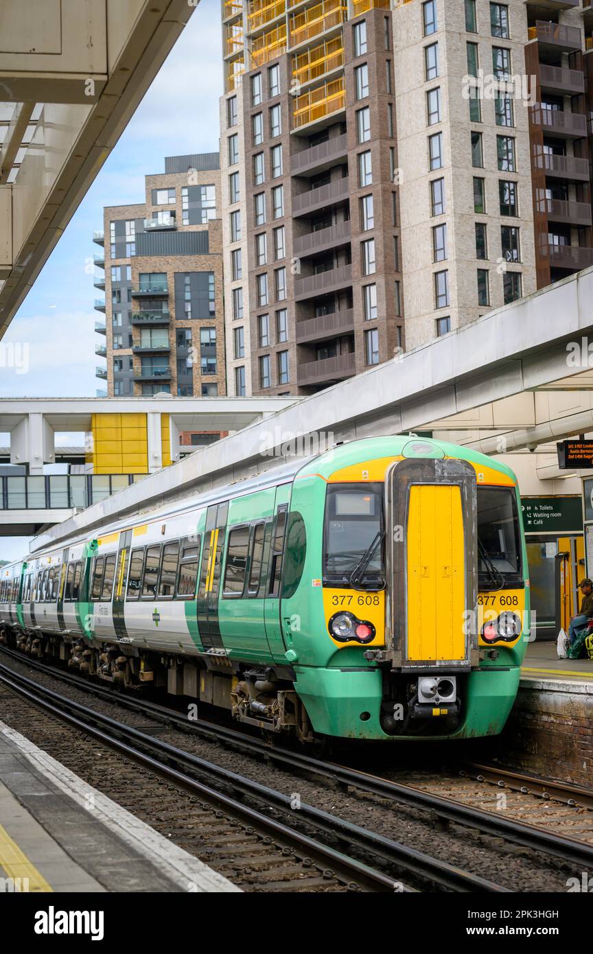 Southern train waiting at a railway station, England Stock Photo - Alamy