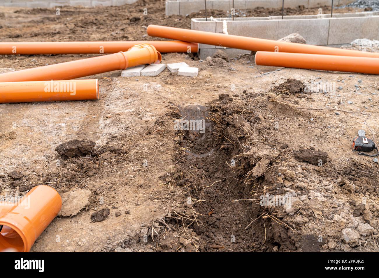 plastic pvc waste sewer pipe in the ground. construction site Stock ...