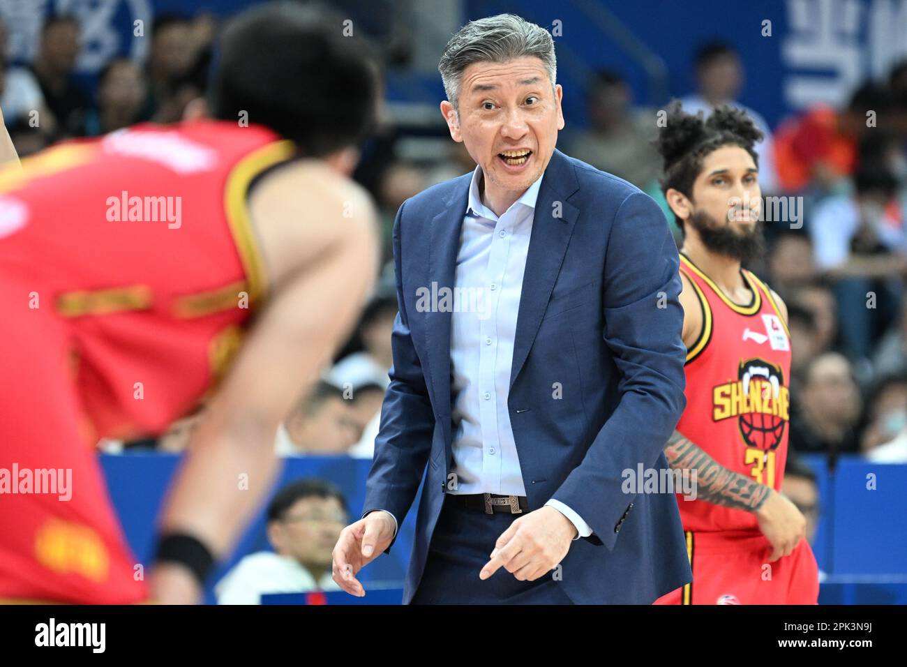 Tianjin. 5th Apr, 2023. Shenzhen Leopards' head coach Zheng Yonggang (C ...