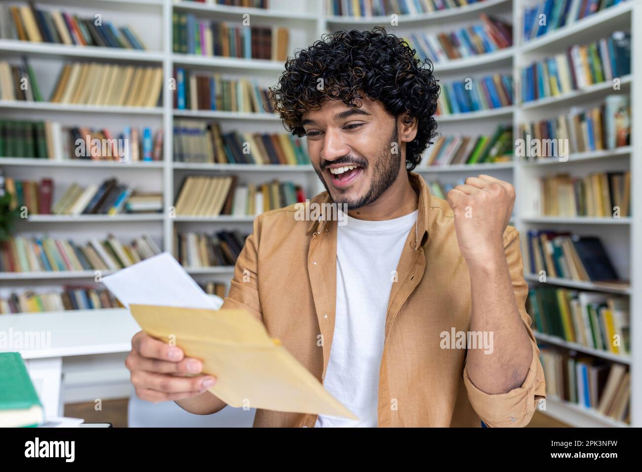 Young student received letter with good exam results and university ...