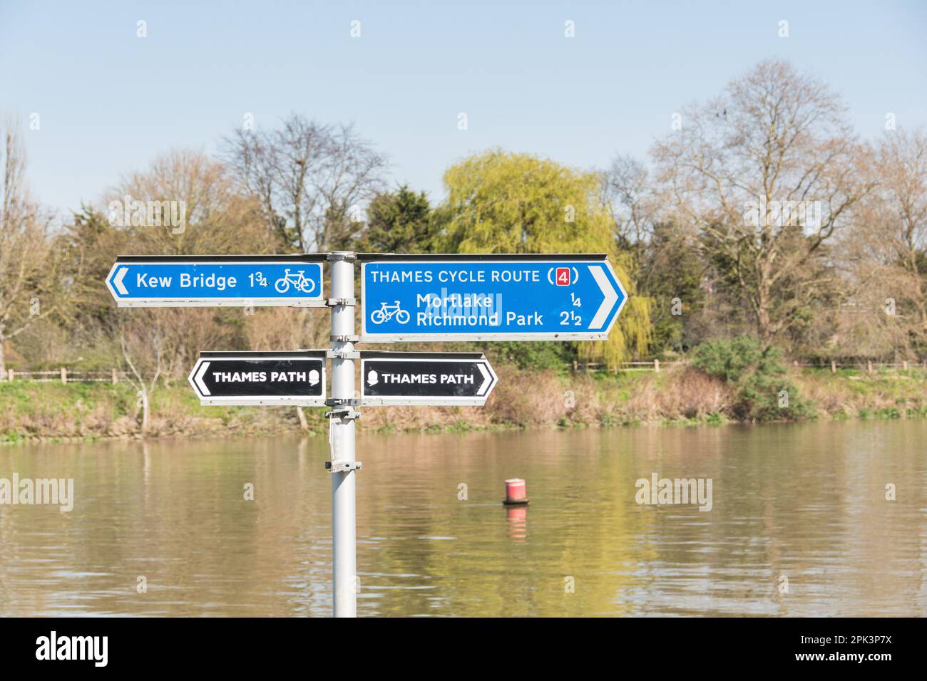 Thames Path directional signage on the towpath at Mortlake, London ...