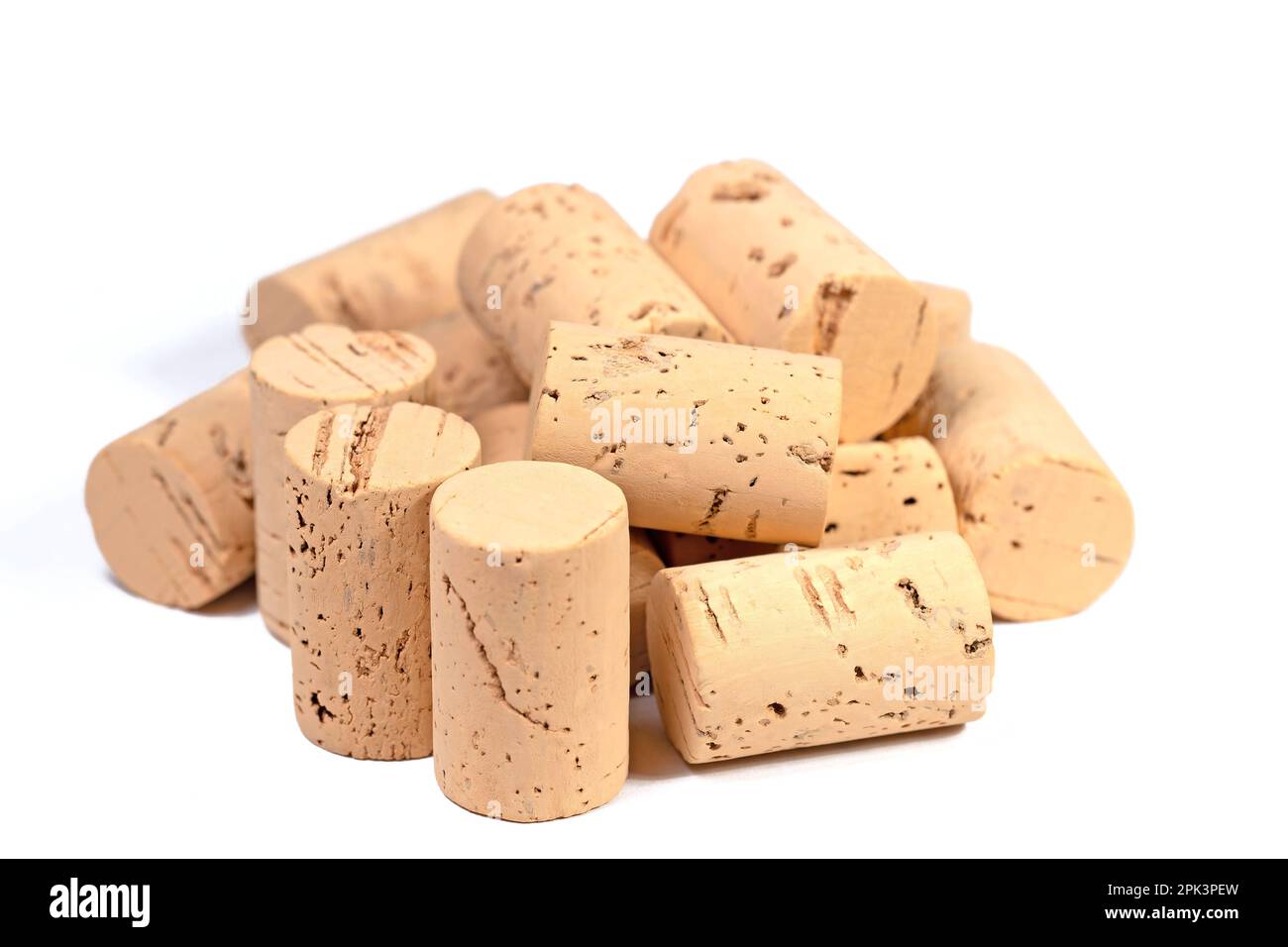 Cork bottle caps against white background Stock Photo - Alamy