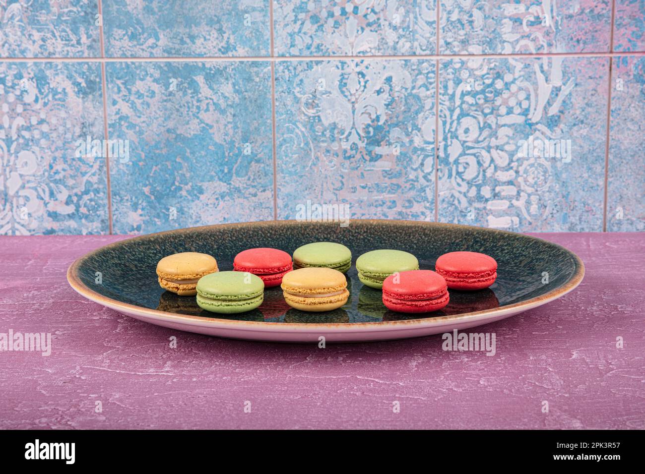 Colorful macarons cakes. Small french muffins. Sweet and colorful ...