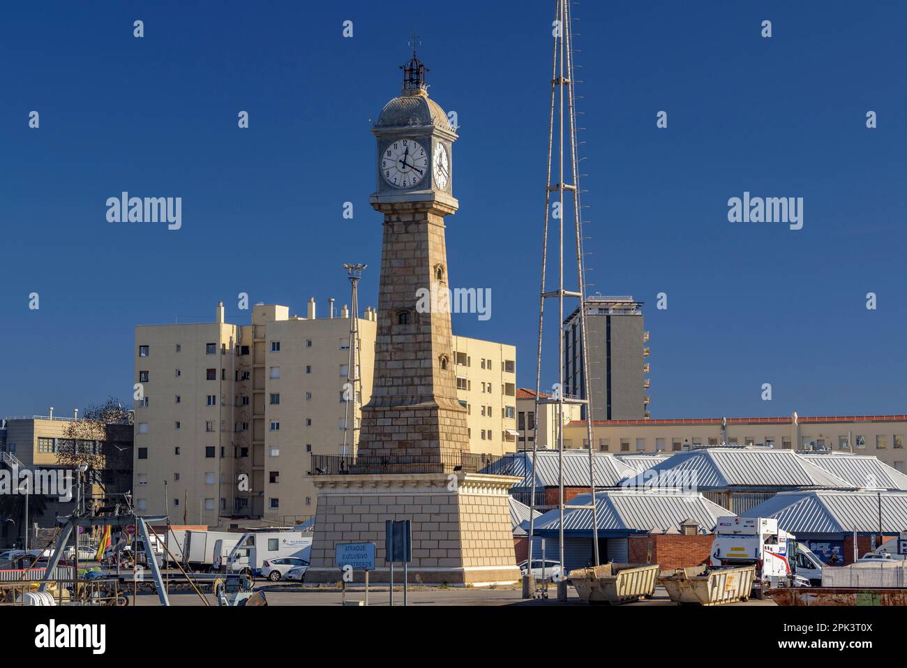 The Clock Tower between the boats of Port Vell (old port) in La ...
