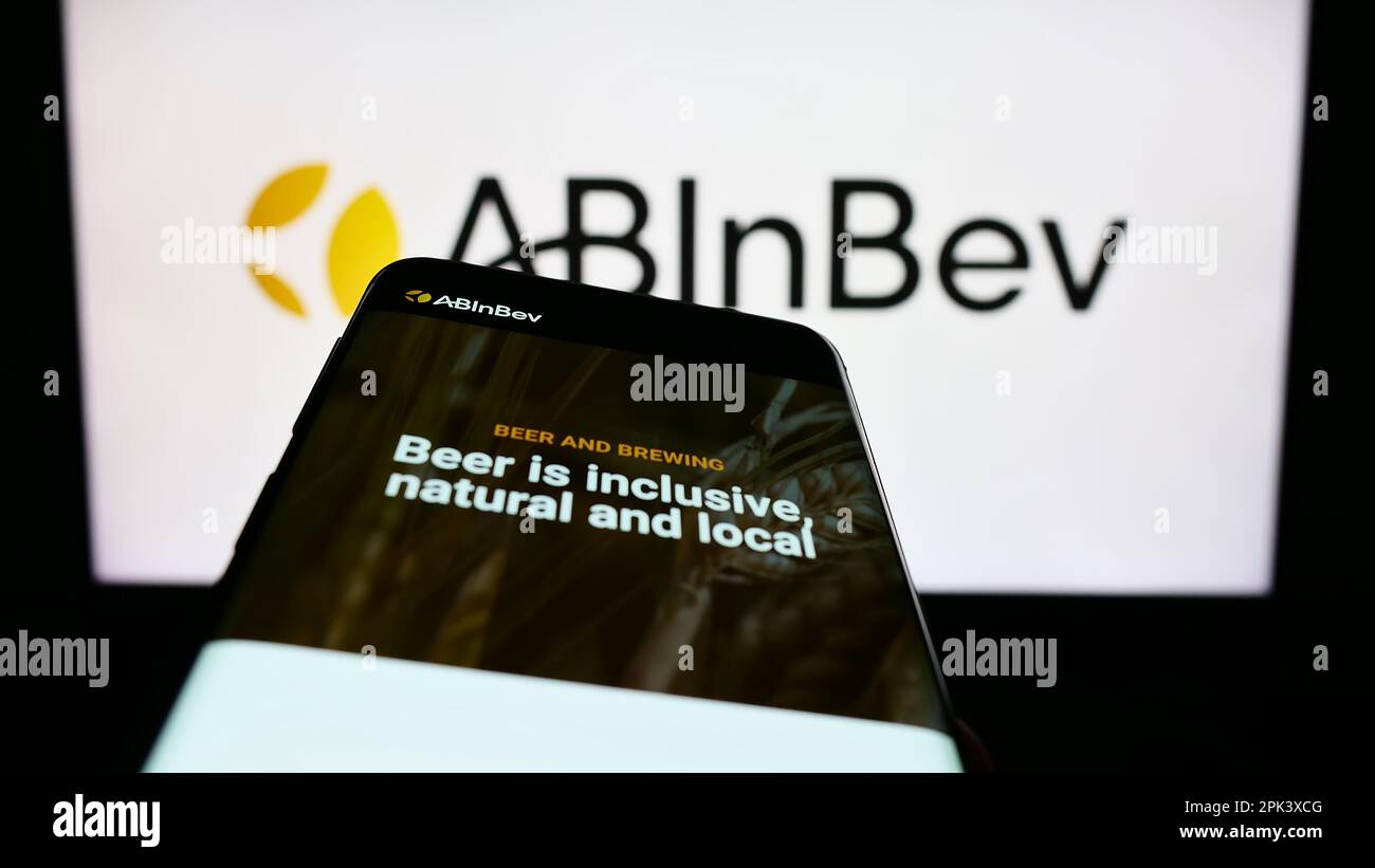 Mobile phone with website of brewing company Anheuser-Busch InBev (AB ...