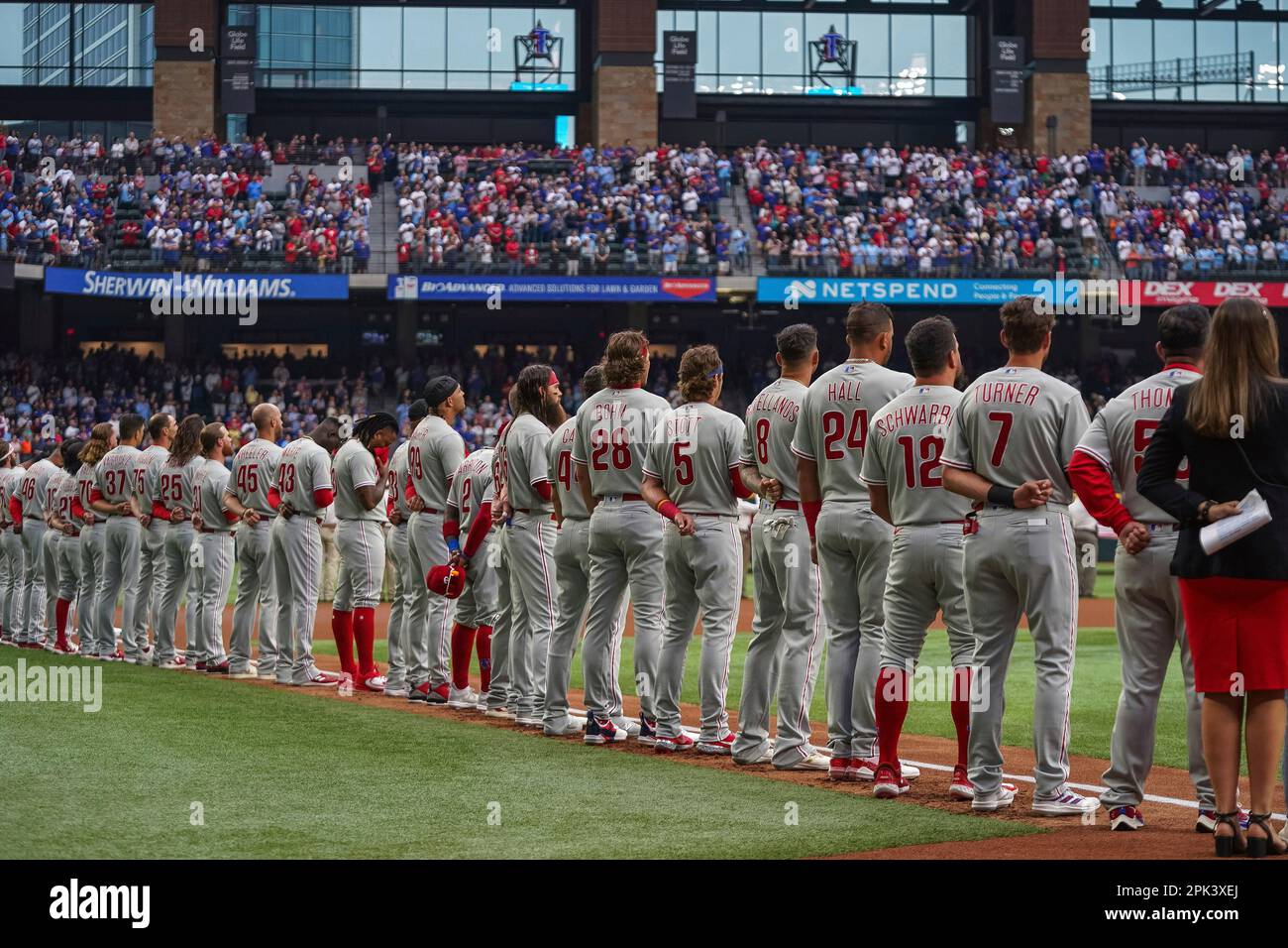 The Philadelphia Phillies stand for the national anthem before an ...
