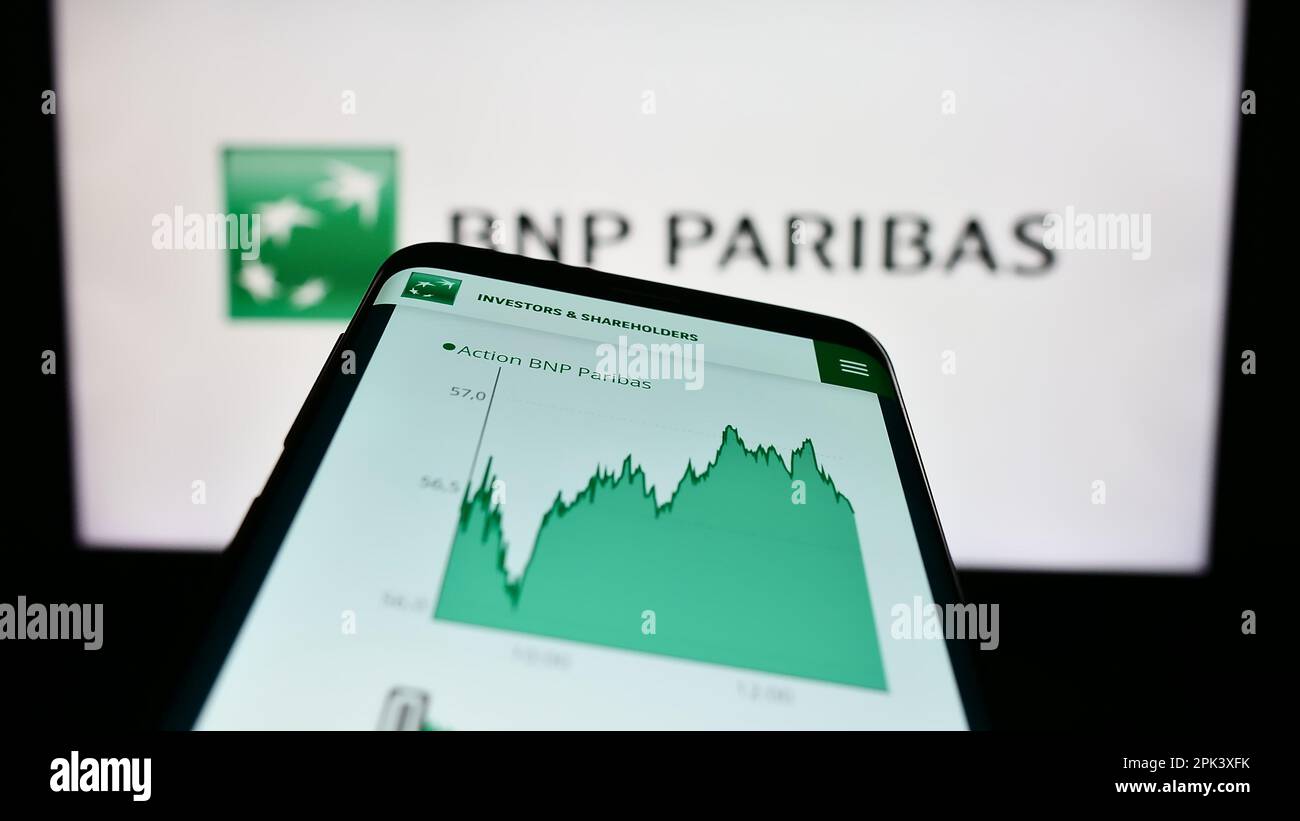 Mobile phone with website of French banking company BNP Paribas S.A. on ...