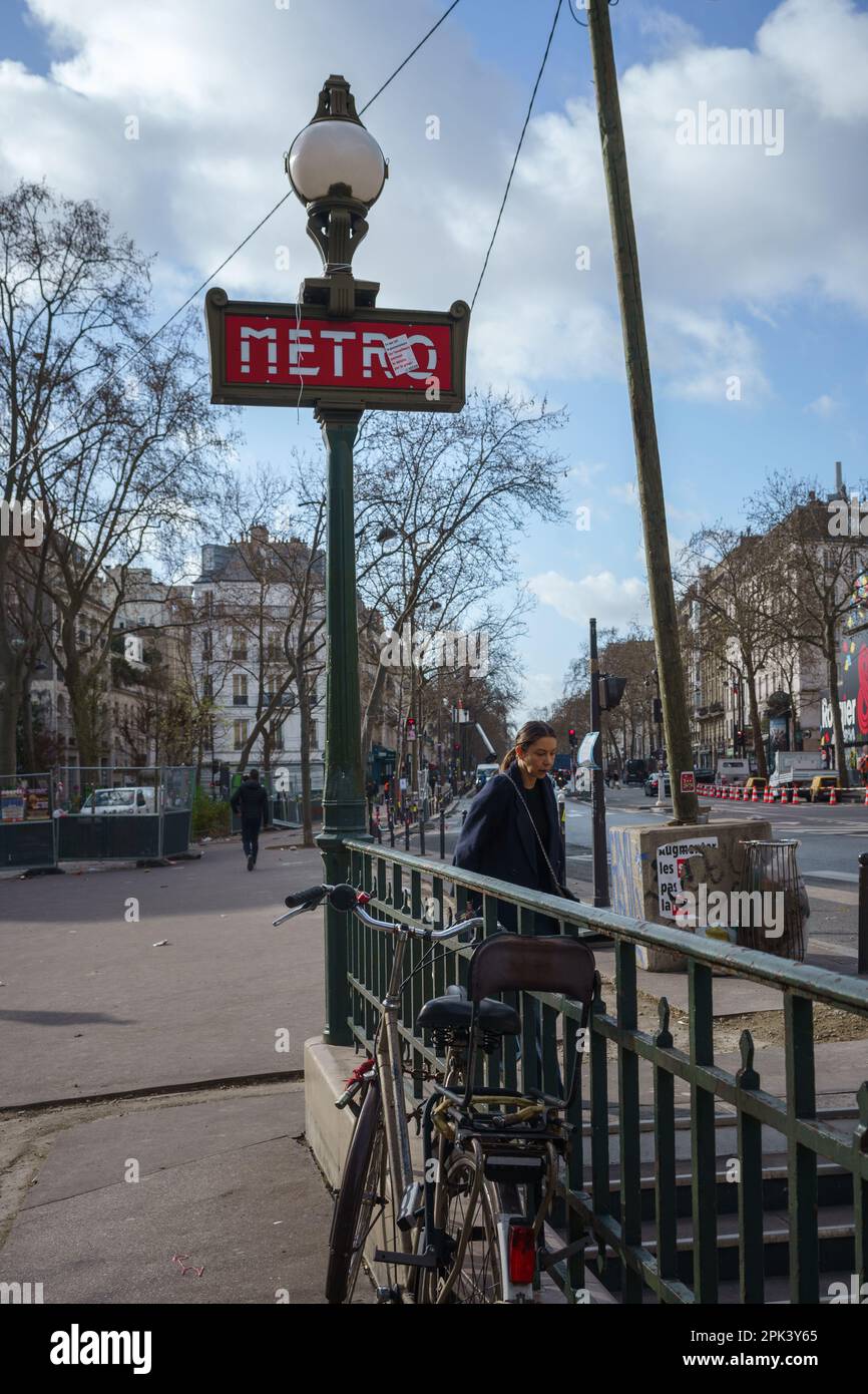 Red Metro sign and entrance in Paris, France. March 24, 2023 Stock ...