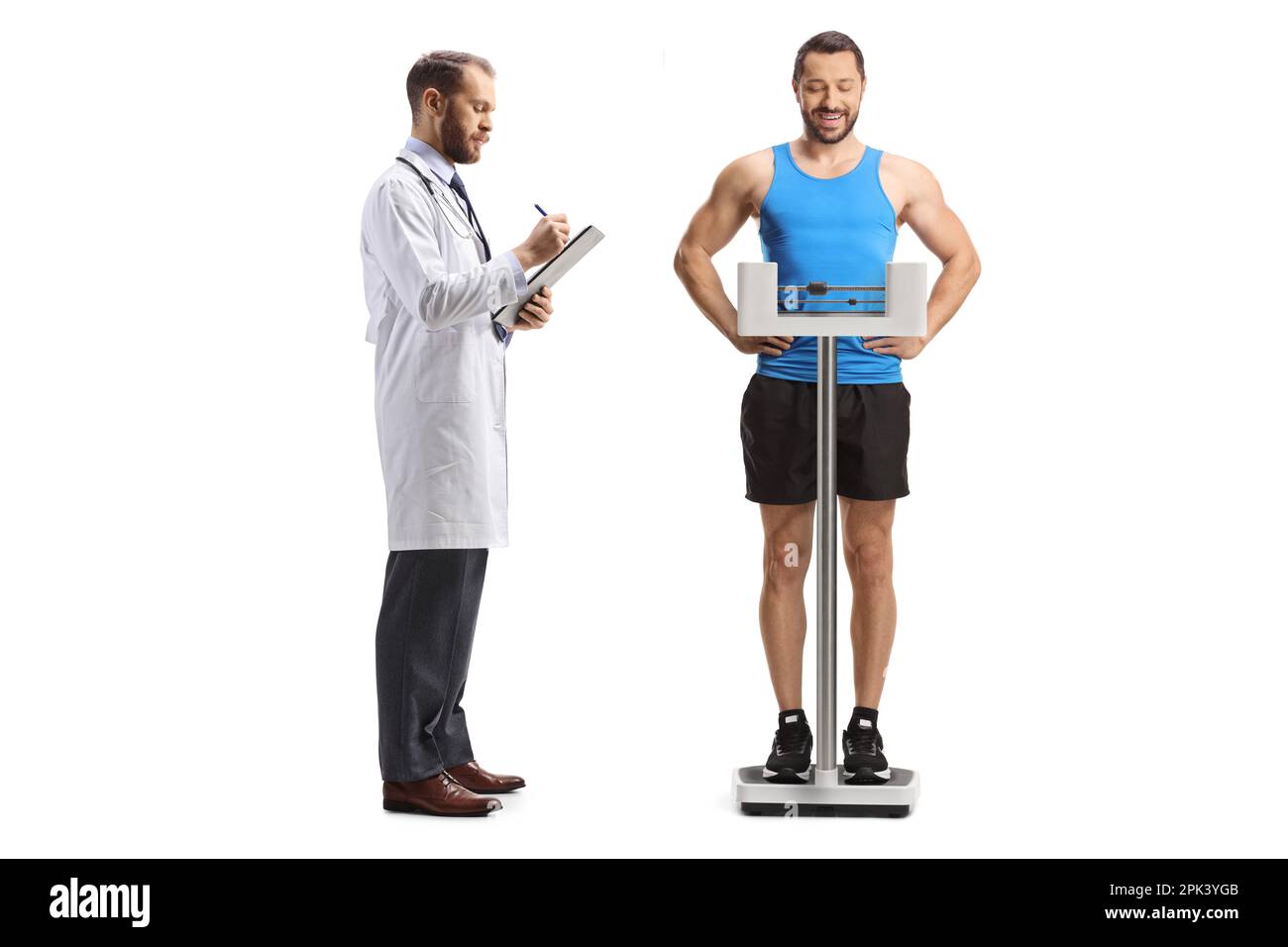 Doctor checking weight of a male athlete isolated on white background ...
