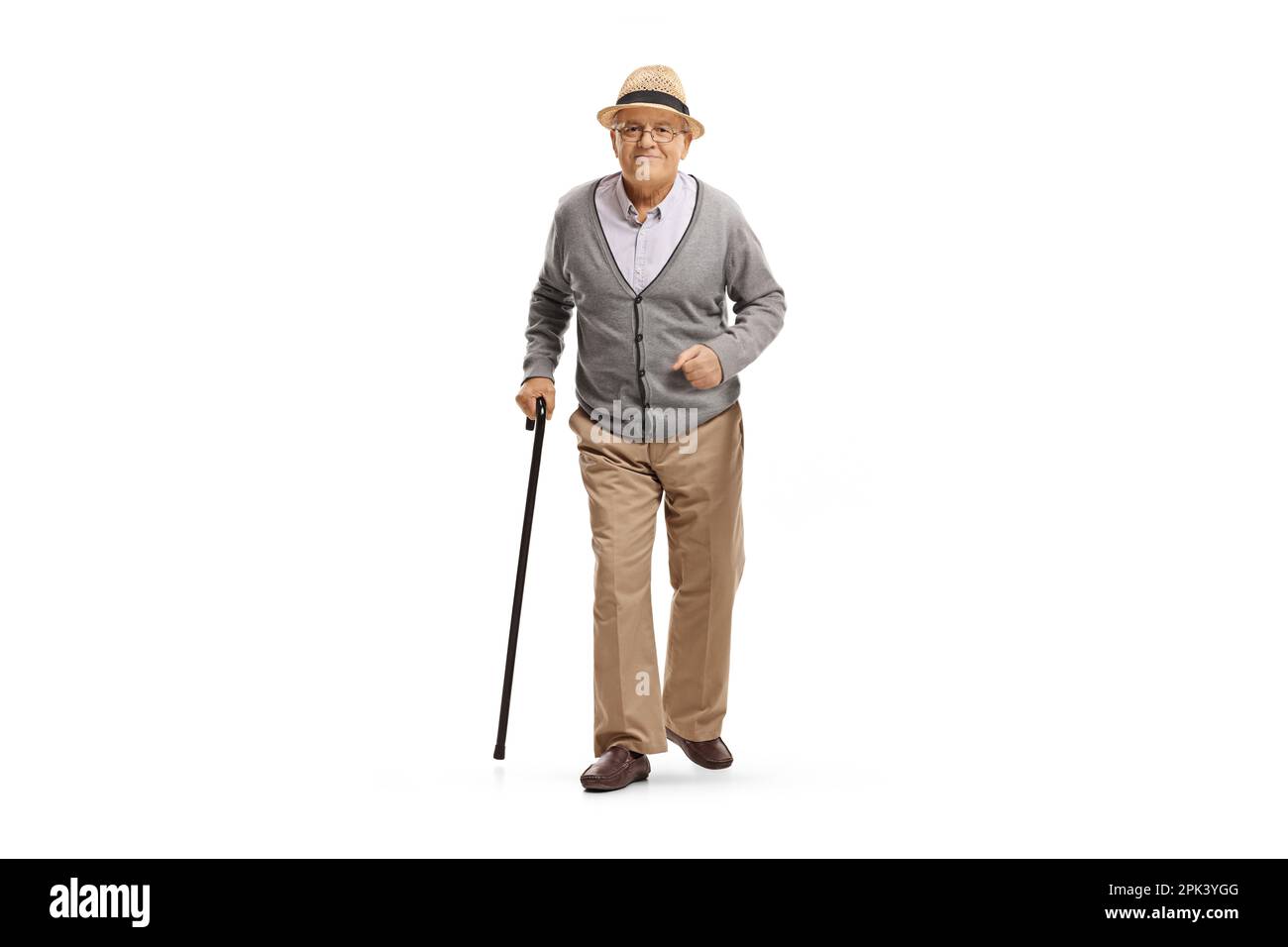 Full length portrait of an elderly man walking with a cane towards ...