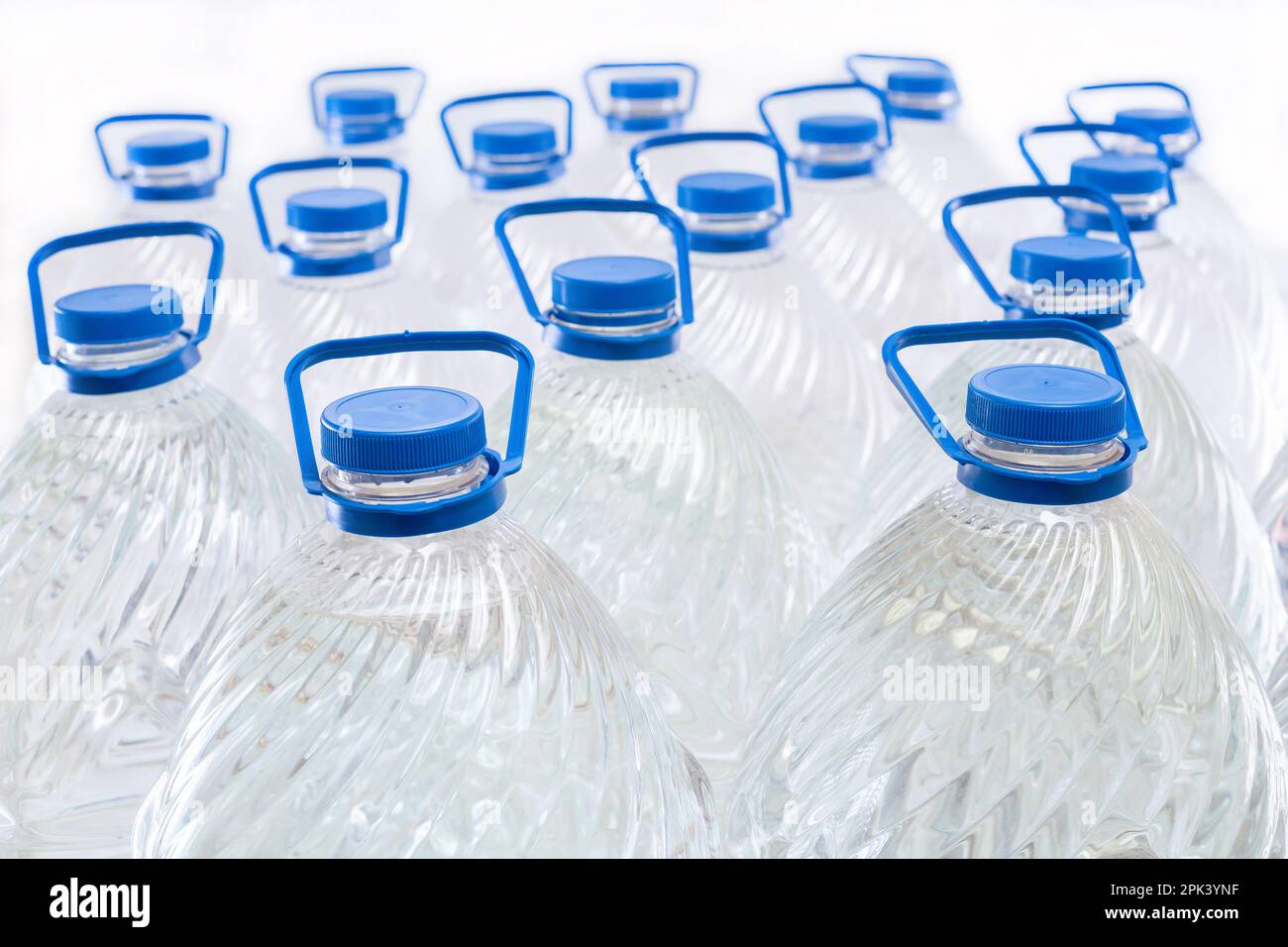 Water in plastic bottles on a white background, isolated Stock Photo ...